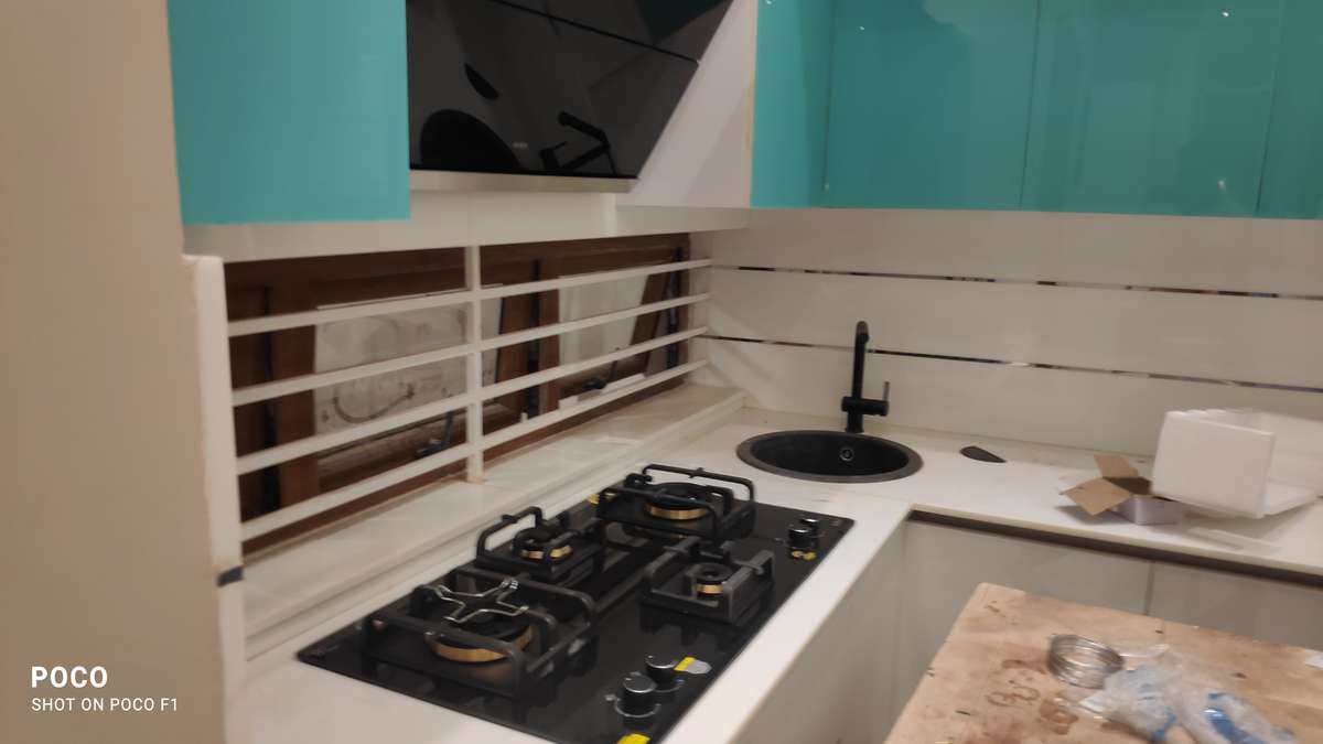 Kitchen, Storage Designs by Flooring Make homes Floorings, Kozhikode | Kolo